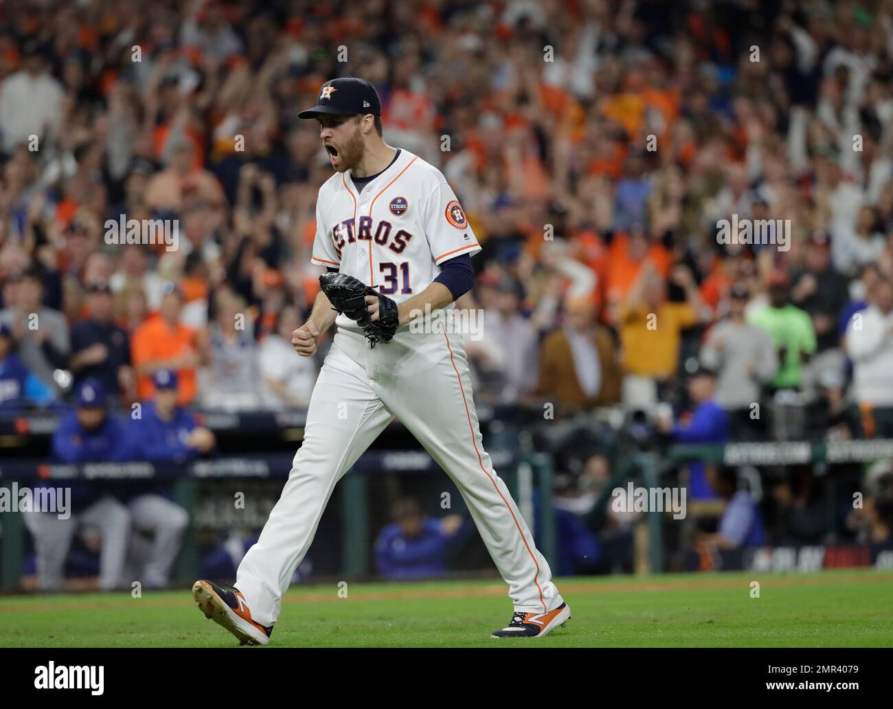 Houston Astros relief pitcher Collin McHugh reacts after getting Los ...