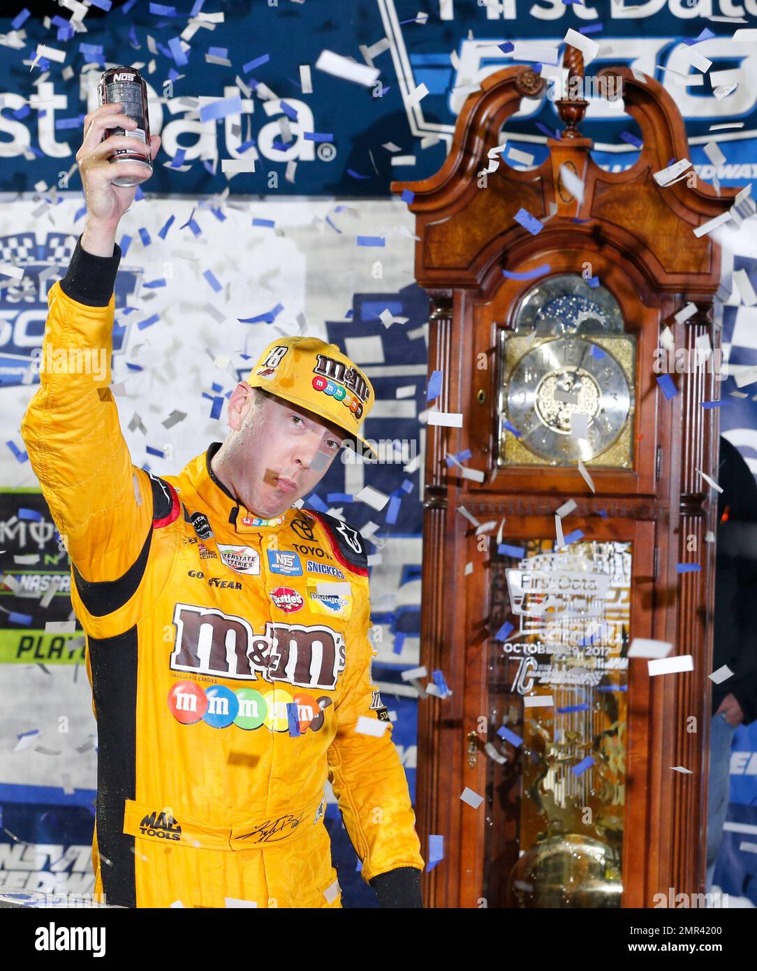 Kyle Busch celebrates after winning the NASCAR Cup series auto race at ...