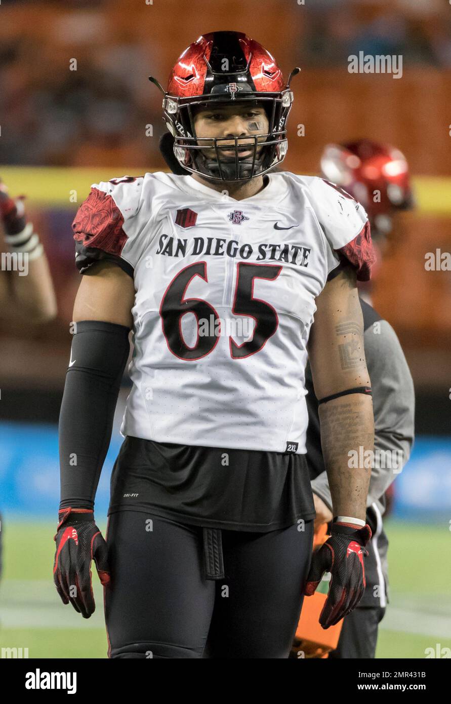 San Diego State defensive lineman Sergio Phillips (65) looks on in the ...