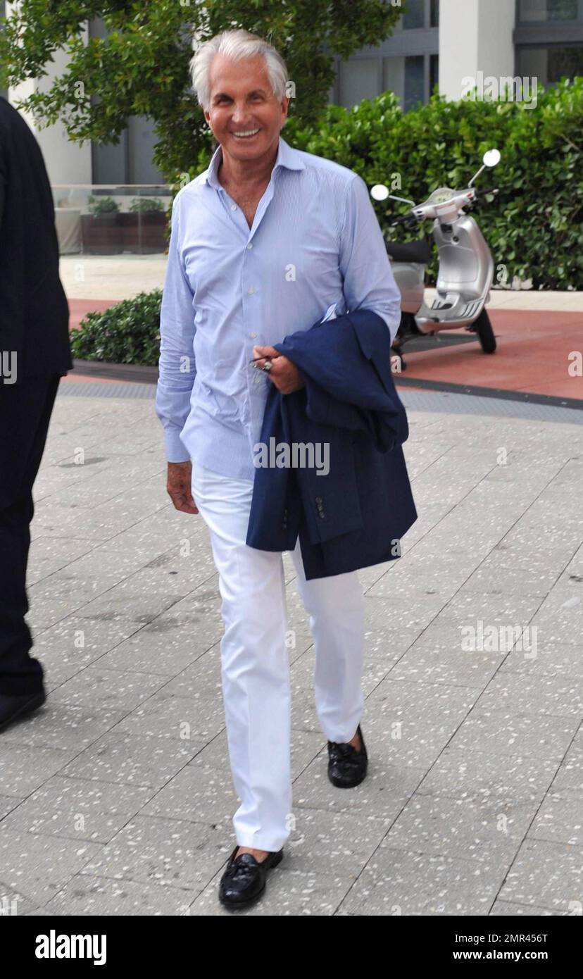 Actor George Hamilton is all smiles as he leaves his luxury hotel while ...