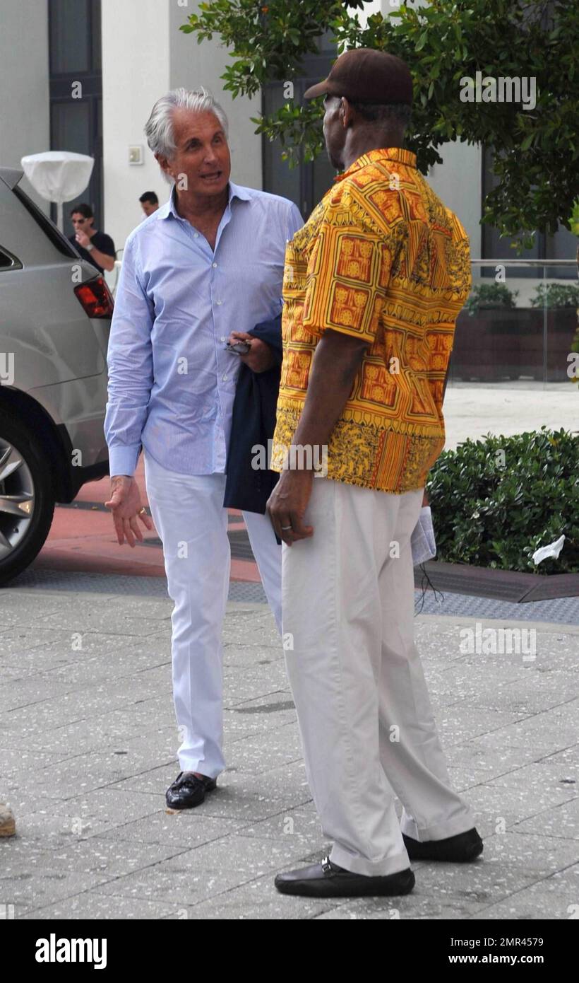 Actor George Hamilton is all smiles as he leaves his luxury hotel while ...