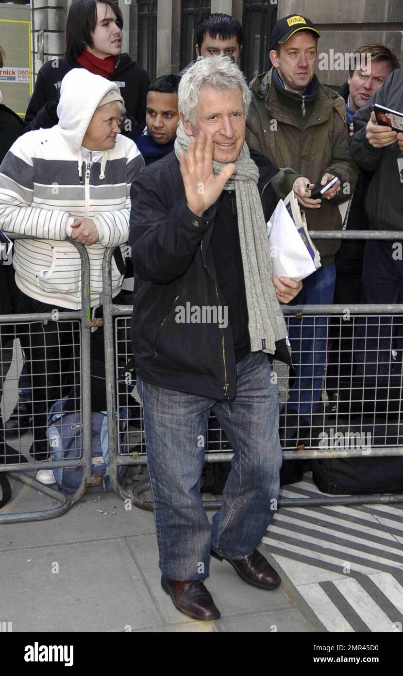 Veteran UK television star George Layton is all smiles as he waves and ...