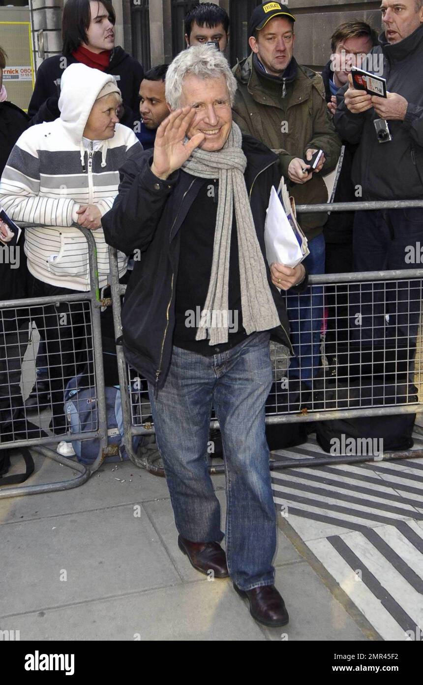 Veteran UK television star George Layton is all smiles as he waves and ...