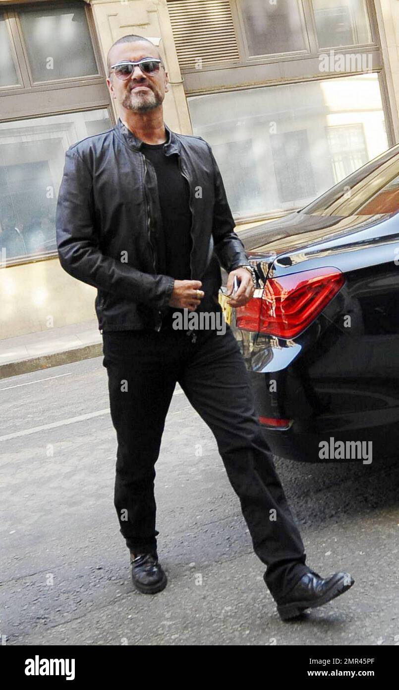 In a pair of trendy shades George Michael, who has been rumored to be a ...