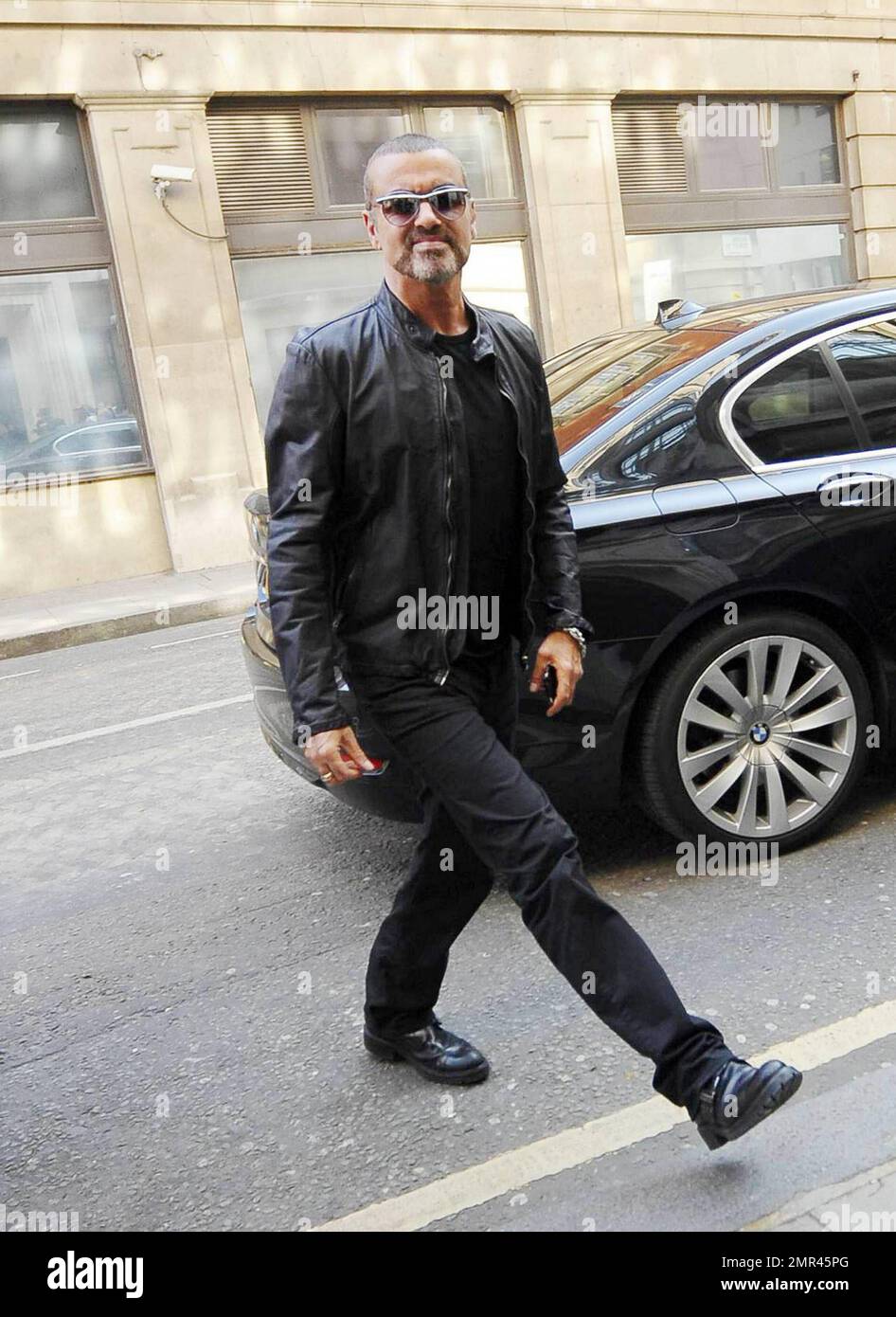 In a pair of trendy shades George Michael, who has been rumored to be a ...
