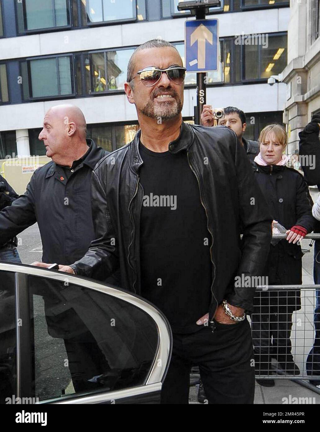 In a pair of trendy shades George Michael, who has been rumored to be a ...