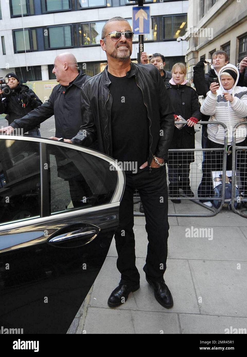 In a pair of trendy shades George Michael, who has been rumored to be a ...