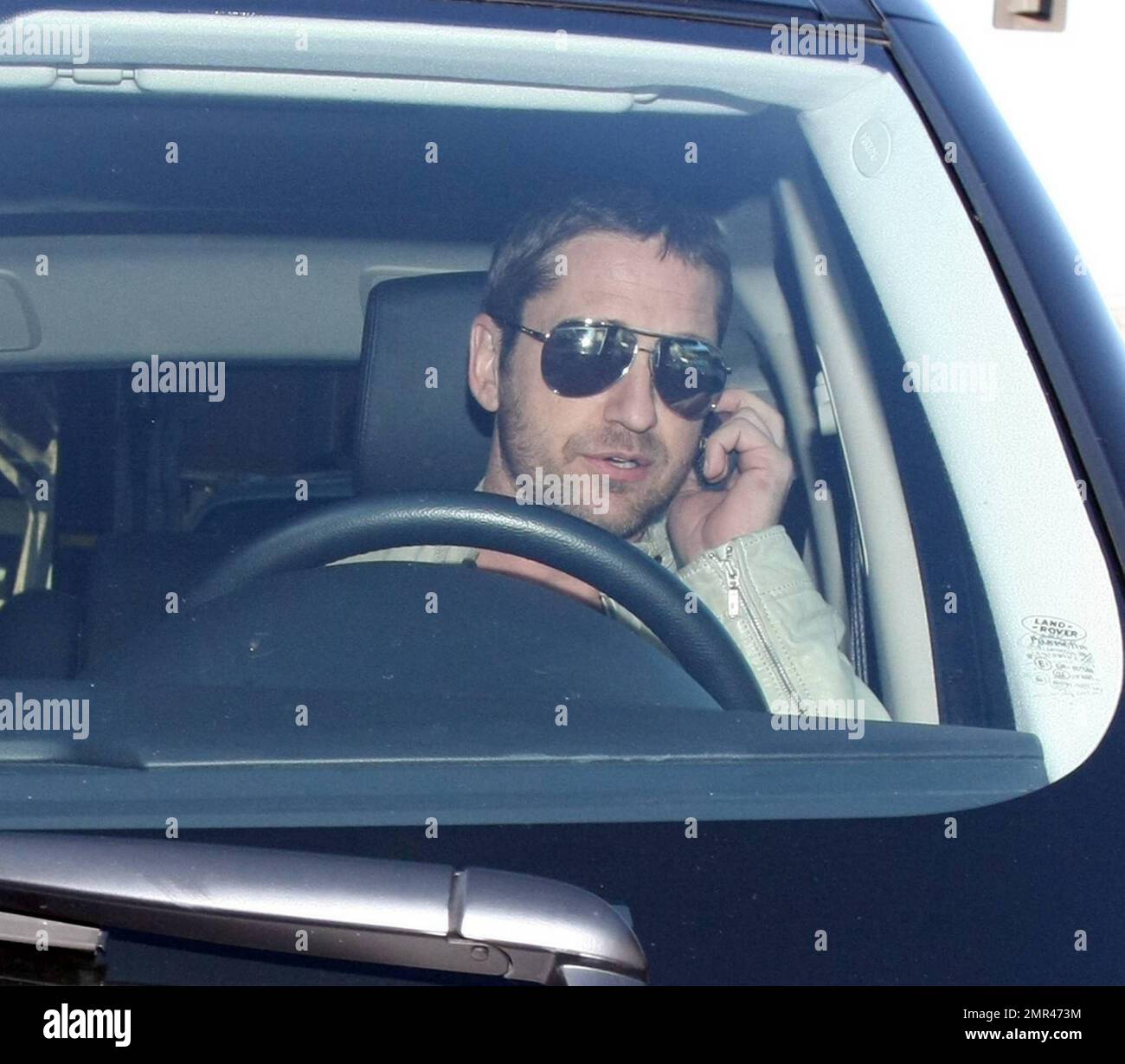 Gerard Butler was spotted out and about driving his Range Rover ...