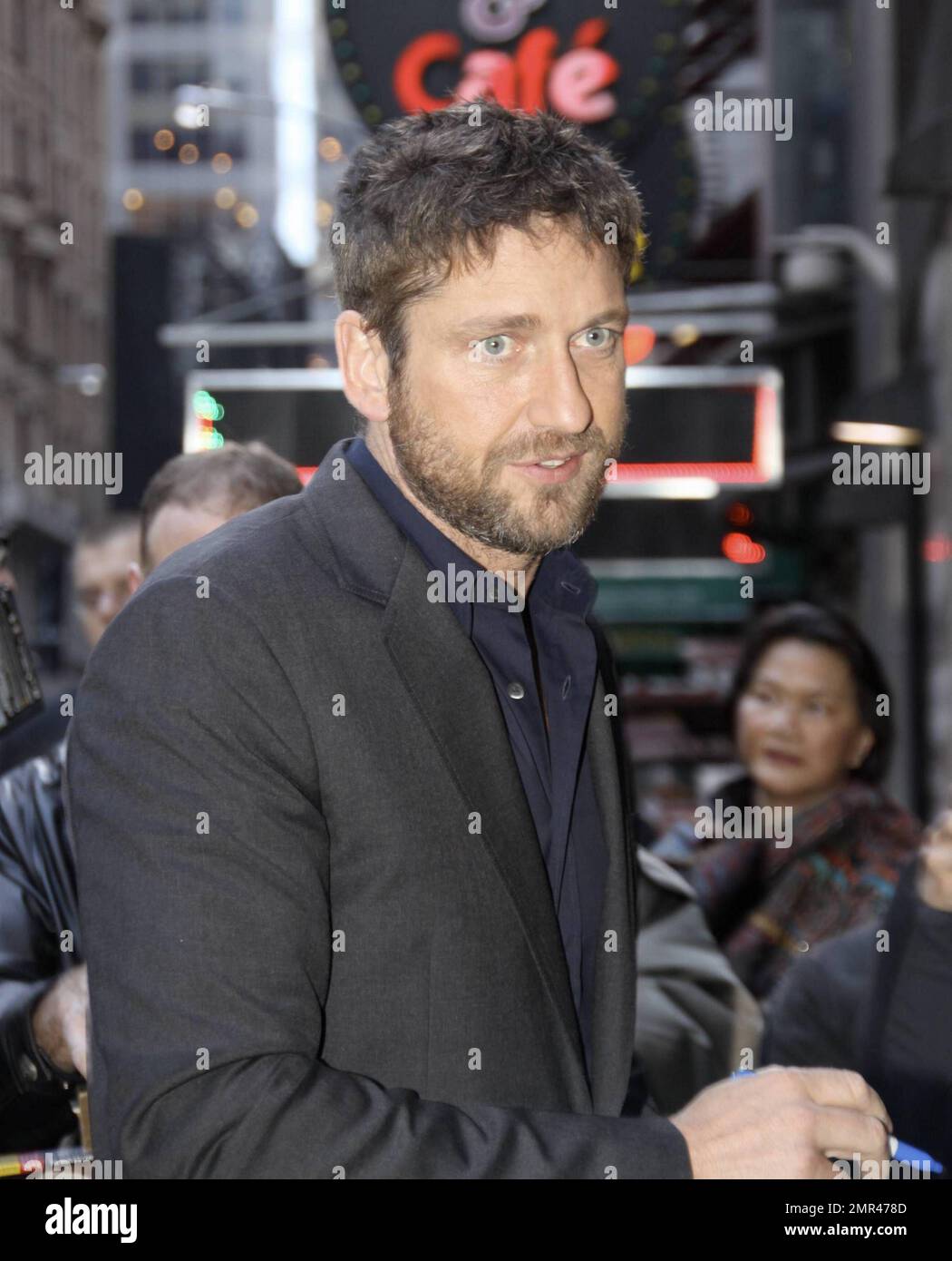 Scottish actor Gerard Butler signs autographs on St. Patrick's Day ...
