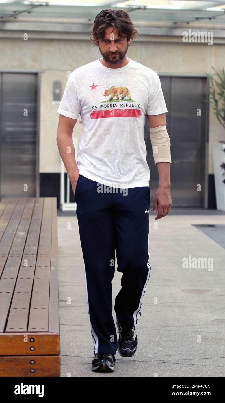 EXCLUSIVE!! Wearing a California Republic t-shirt and carrying along a ...