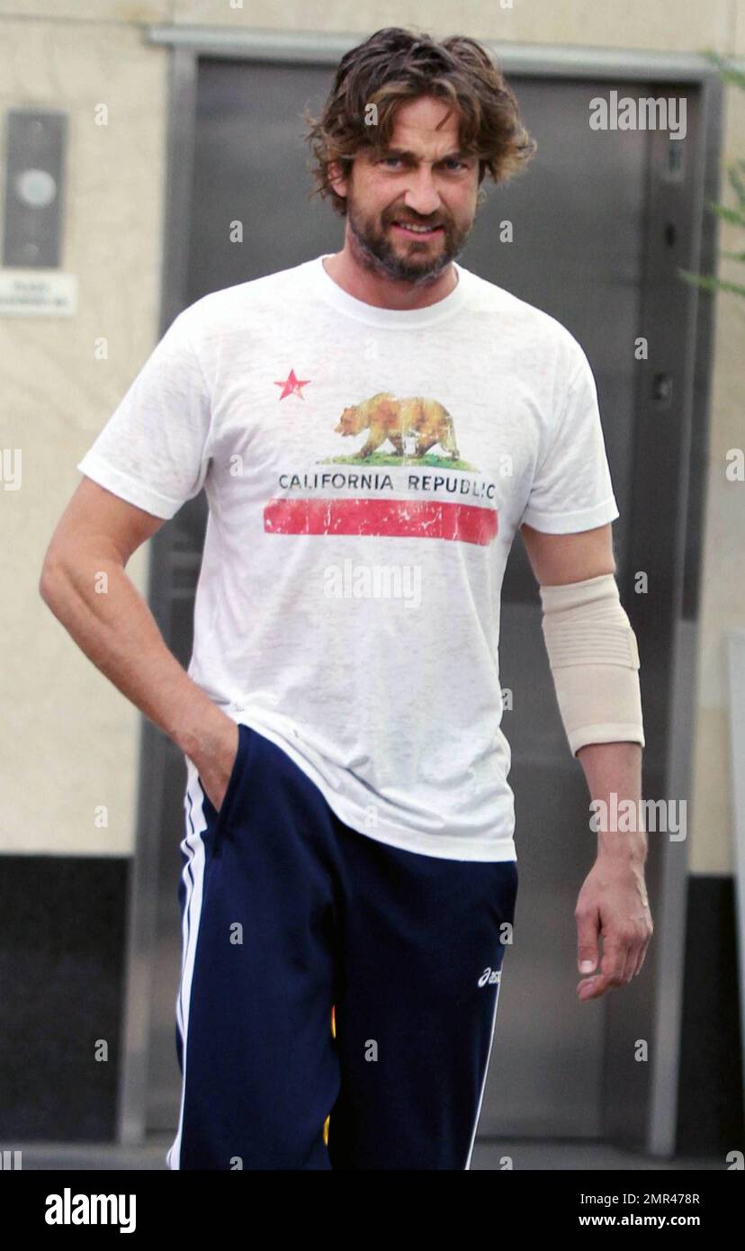 EXCLUSIVE!! Wearing a California Republic t-shirt and carrying along a ...