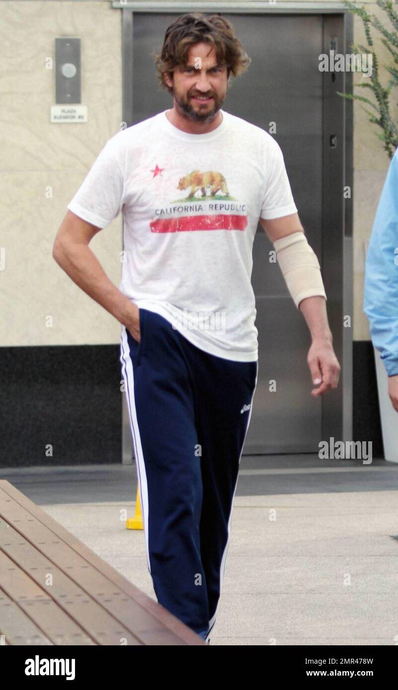 EXCLUSIVE!! Wearing a California Republic t-shirt and carrying along a ...