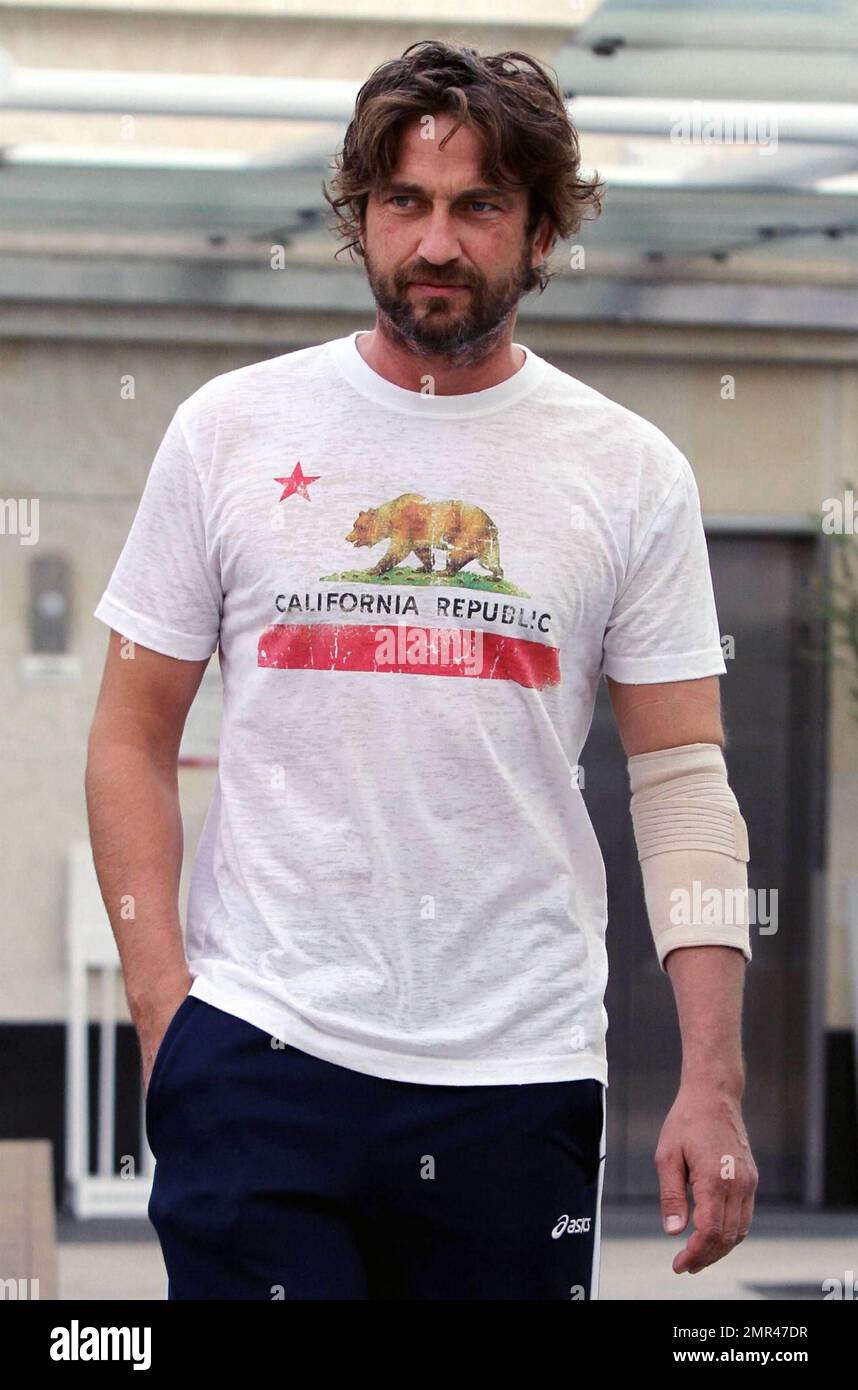 EXCLUSIVE!! Wearing a California Republic t-shirt and carrying along a ...