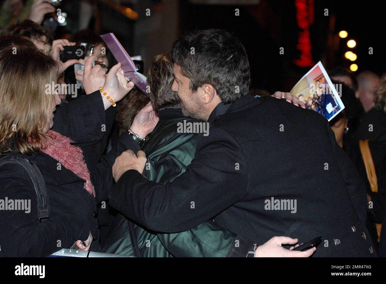 Scottish actor Gerard Butler signs autographs in his traditional ...