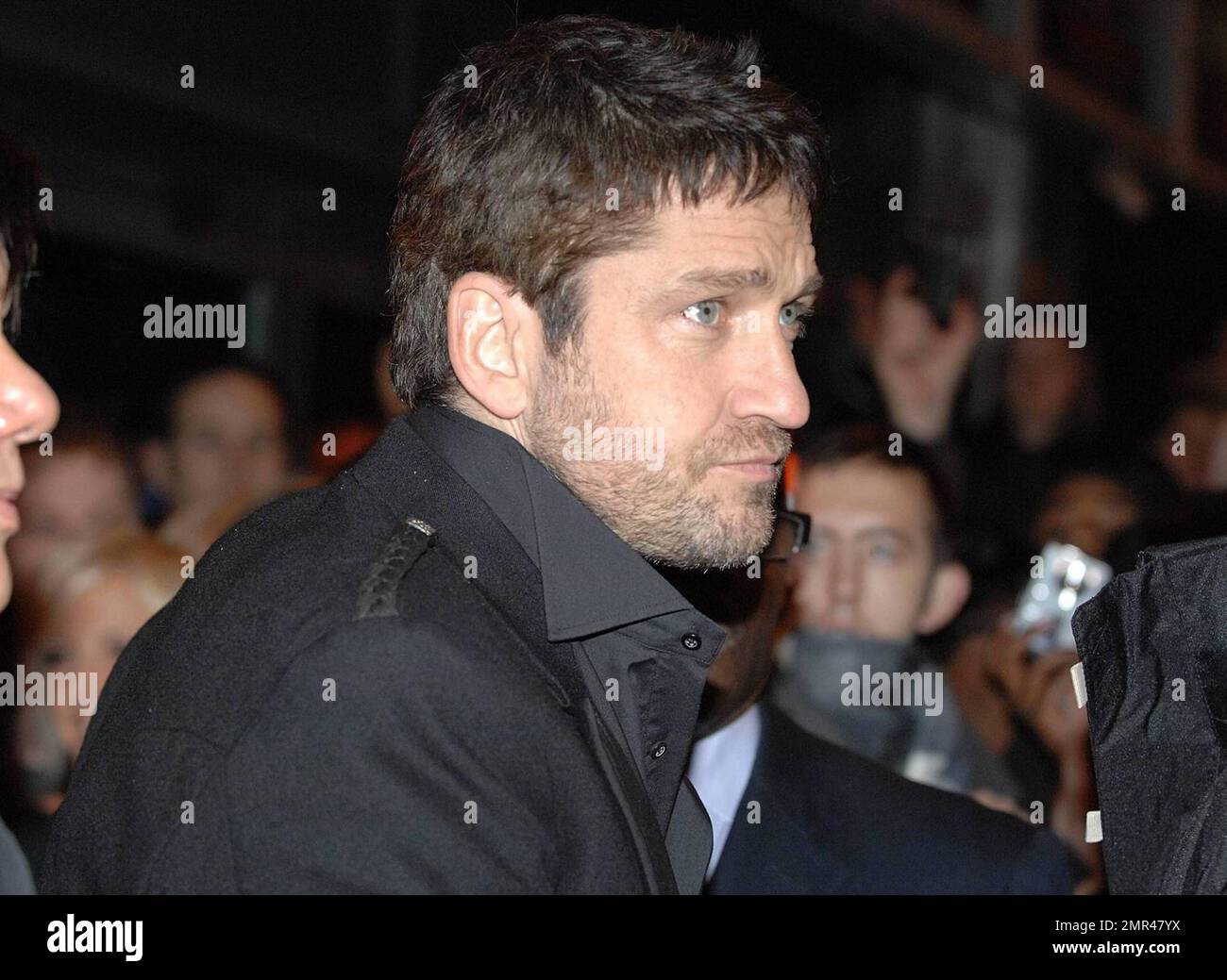Scottish actor Gerard Butler signs autographs in his traditional ...