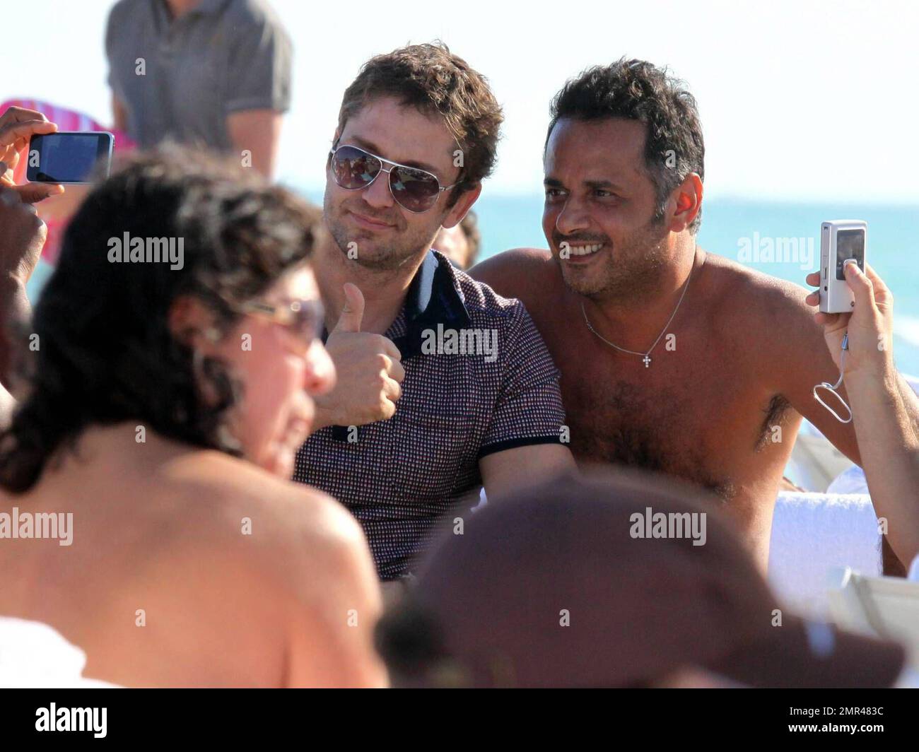 Actor Gerard Butler enjoys a day relaxing on the beach in Miami's South ...