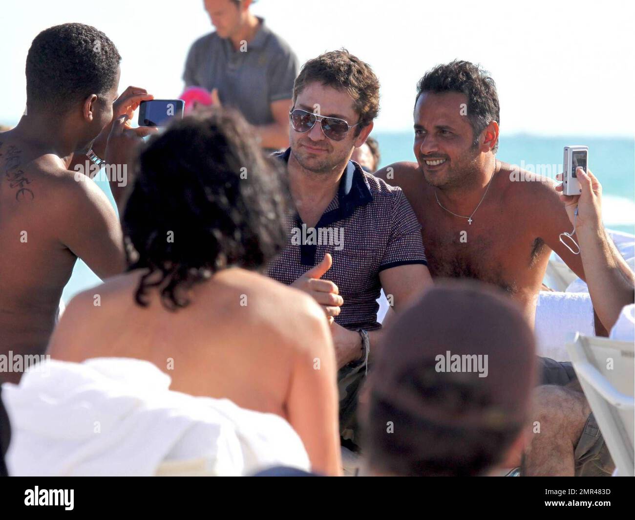 Actor Gerard Butler enjoys a day relaxing on the beach in Miami's South ...