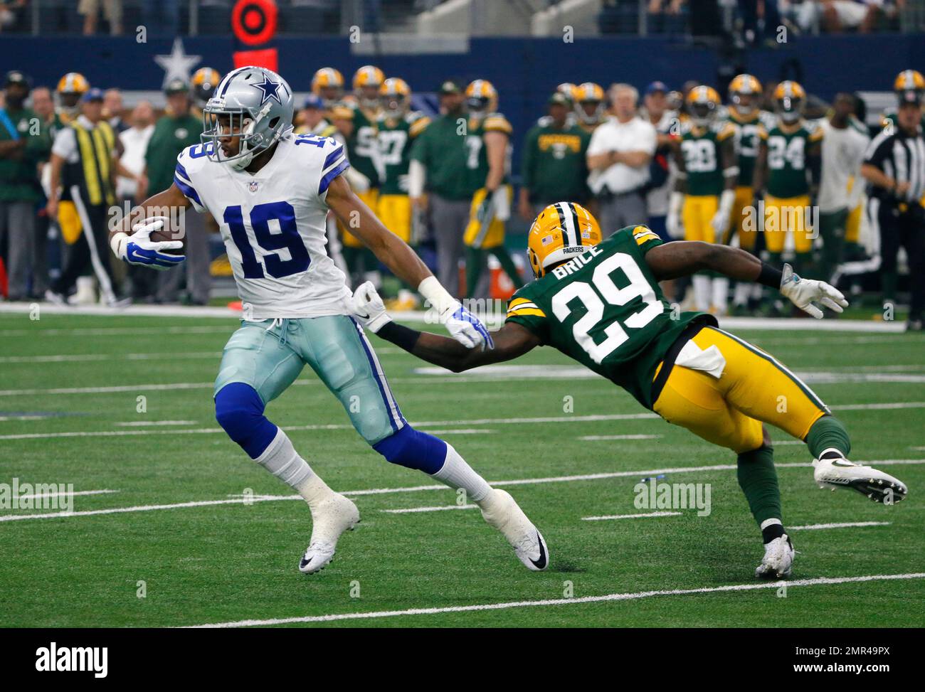 Dallas Cowboys wide receiver Brice Butler (19) evades a tackle attempt ...