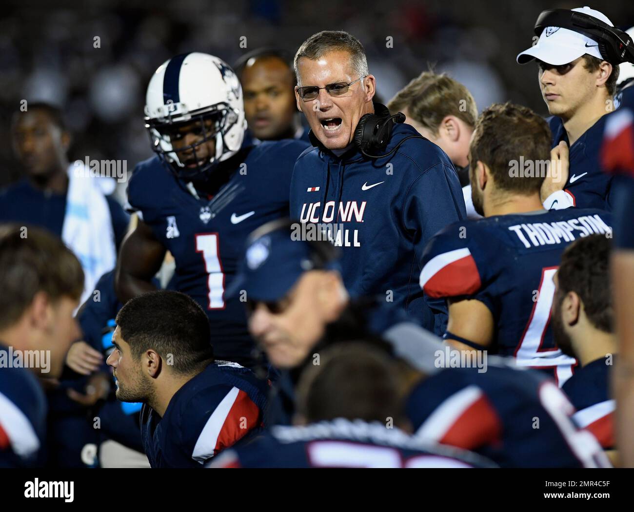 Connecticut head coach Randy Edsall talks to his team during the second ...
