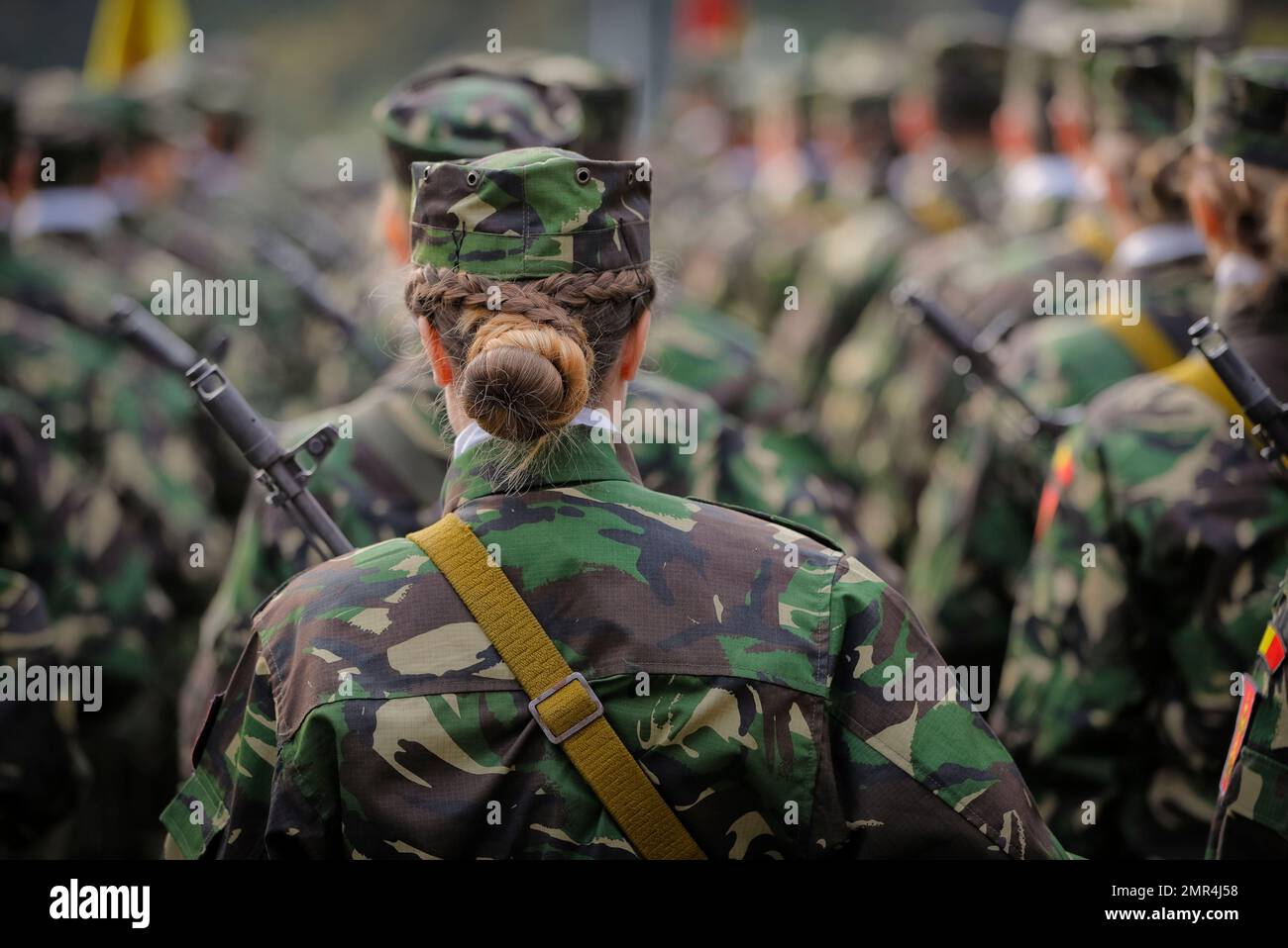 Students parade during the swearing in ceremony for the military ...