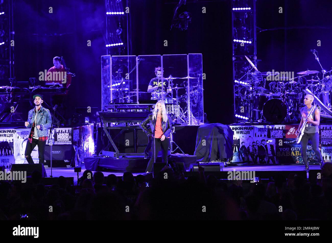 Alanis Morissette, center, Adrian Young and Tony Kanal perform with ...