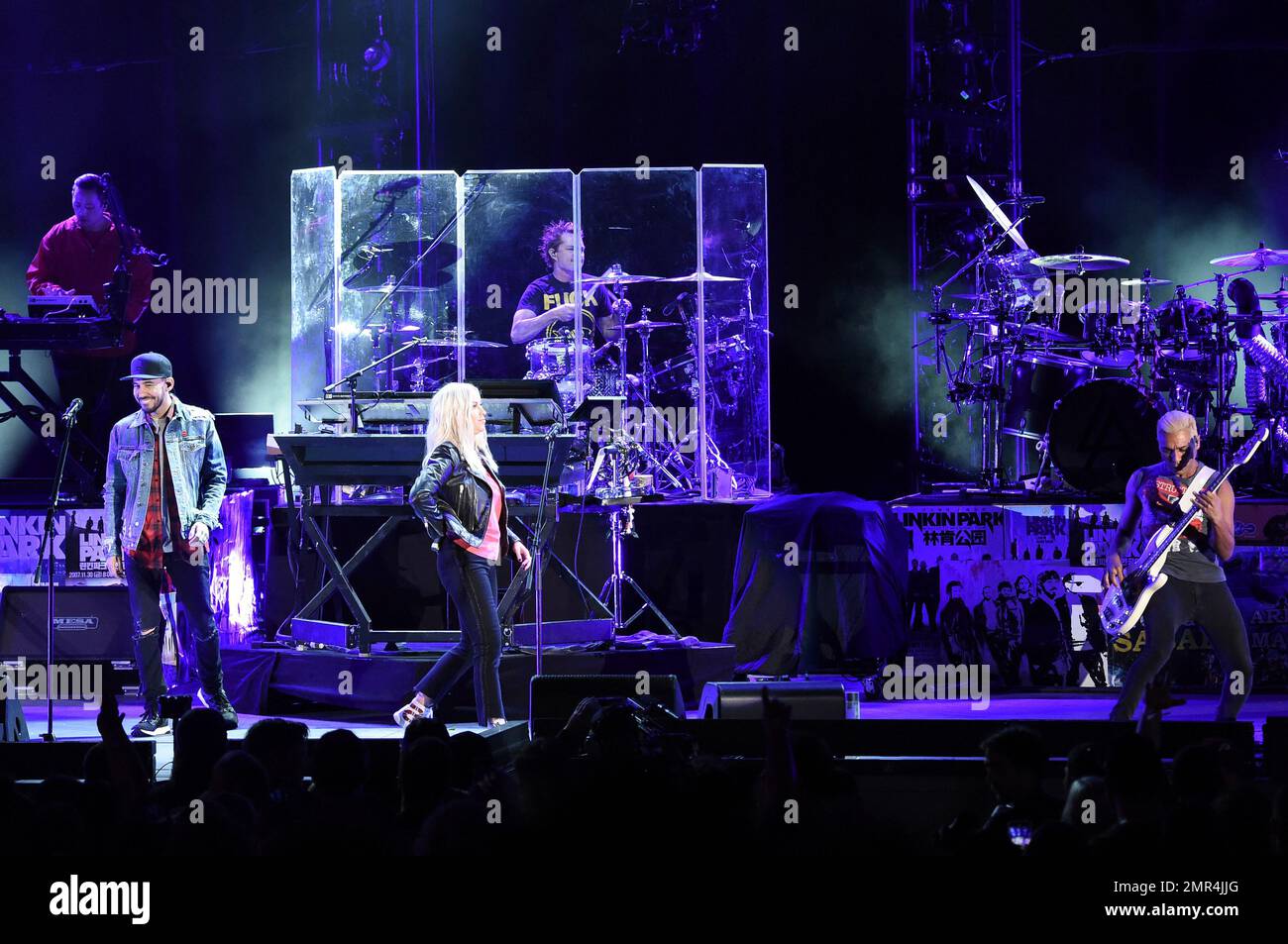 Alanis Morissette, center, Adrian Young and Tony Kanal perform with ...