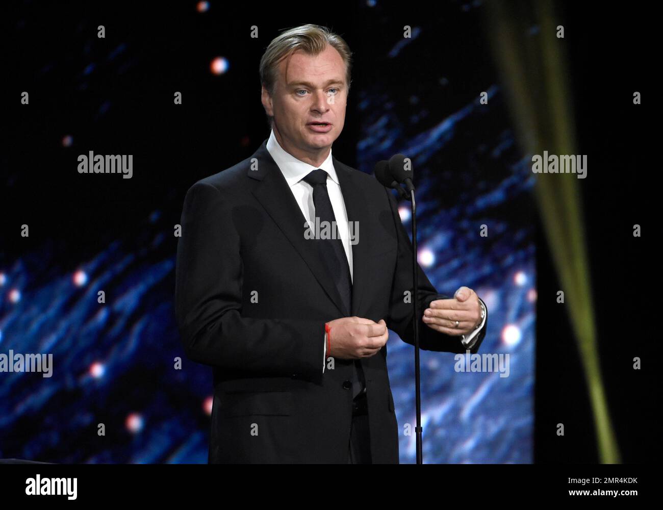 Christopher Nolan presents the Albert R. Broccoli award for worldwide ...