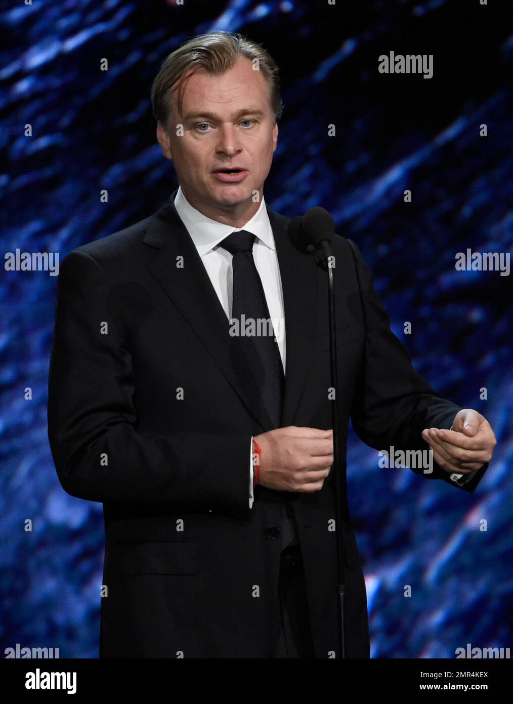 Christopher Nolan presents the Albert R. Broccoli award for worldwide ...