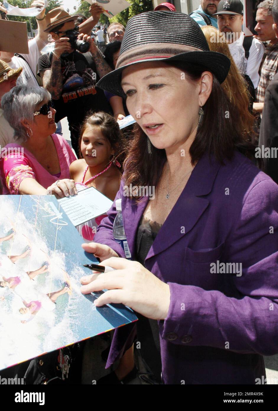 Kathy Valentine of the band The Go-Go's sign autographs at the Go-Go's ...