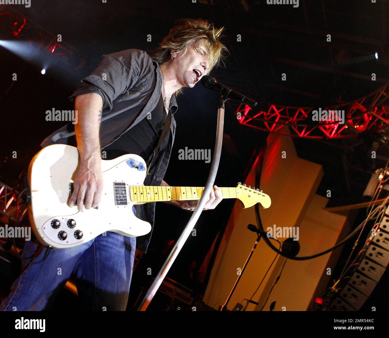 John Rzeznik, lead singer of the Goo Goo Dolls, performs with the rest ...