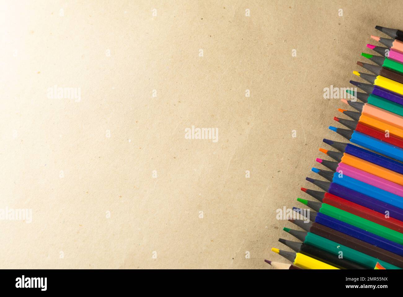 Colored pencils lined up on the right side of the image. isolated on ...