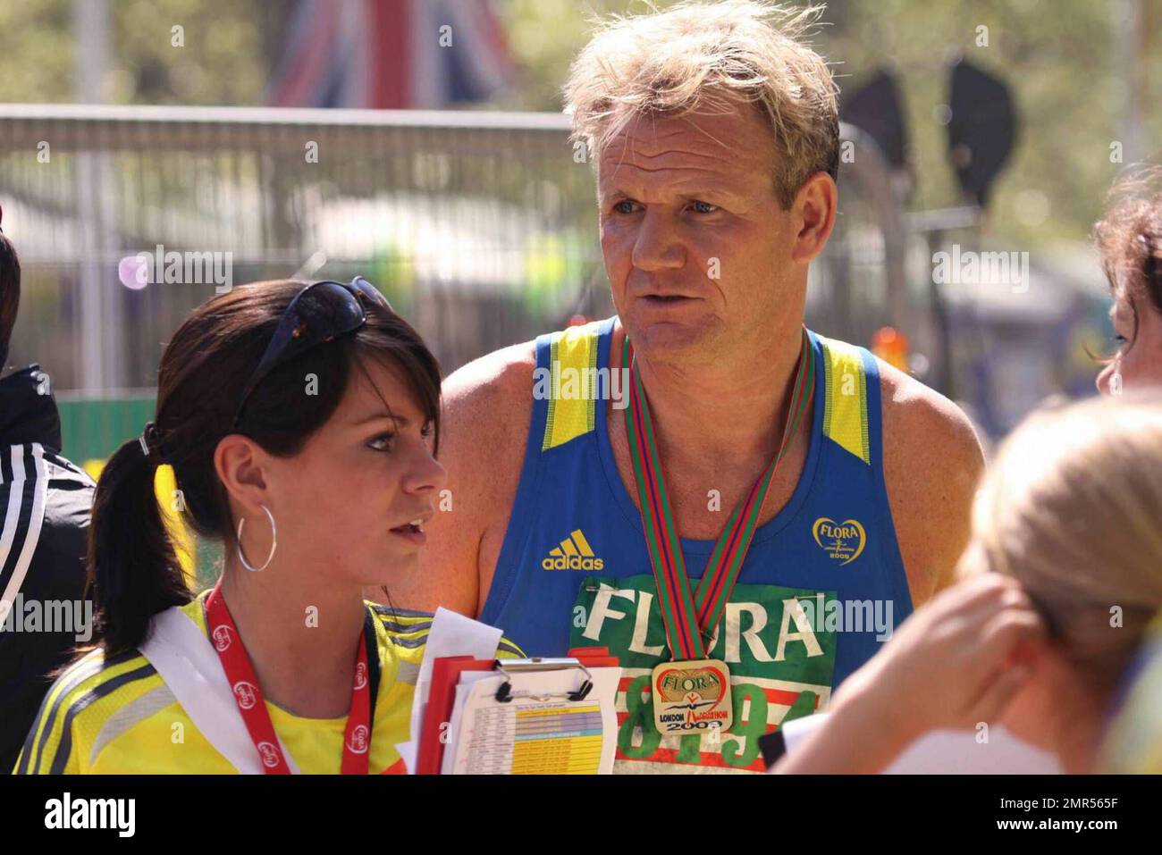 Gordon Ramsay shows off his medal after completing the Flora London ...