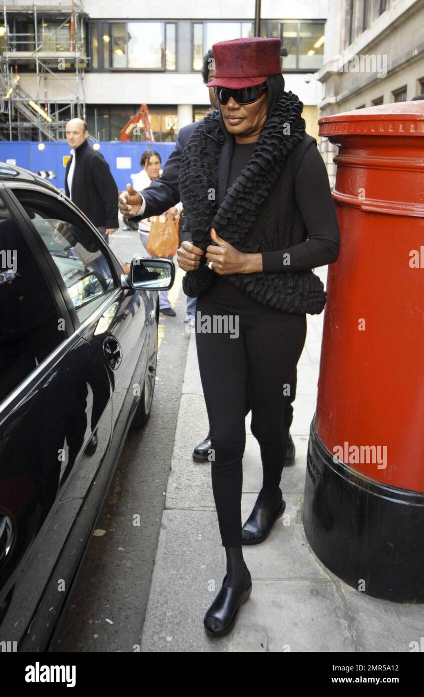 Grace Jones signs autographs for her loyal fans outside the BBC. As ...