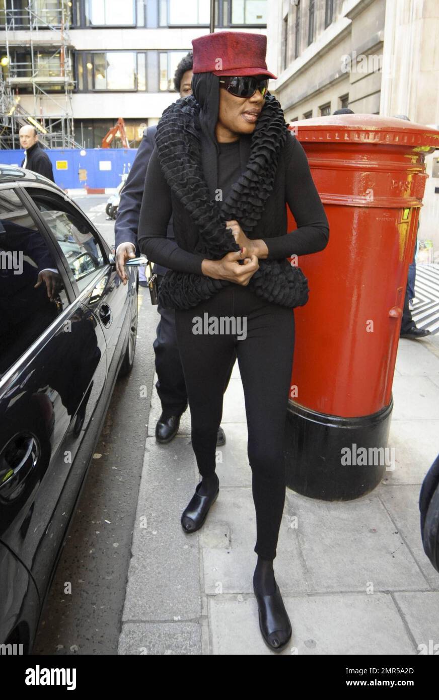 Grace Jones signs autographs for her loyal fans outside the BBC. As ...