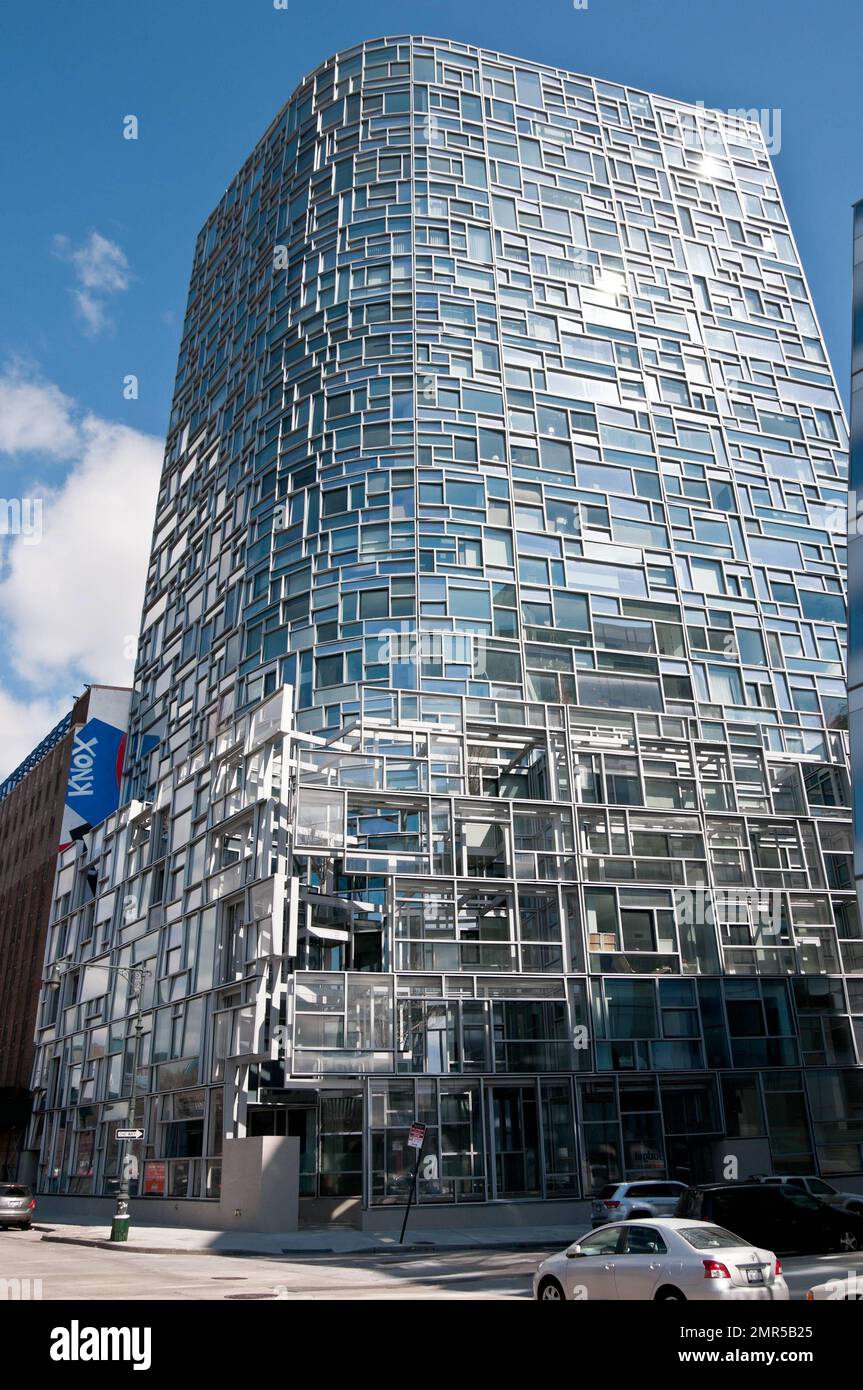 Exterior views of the architecturally stunning glass apartment building ...