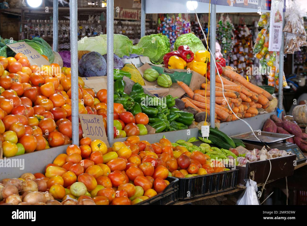 Vegetables such as tomatoes, green peppers and carrots for sale at a ...