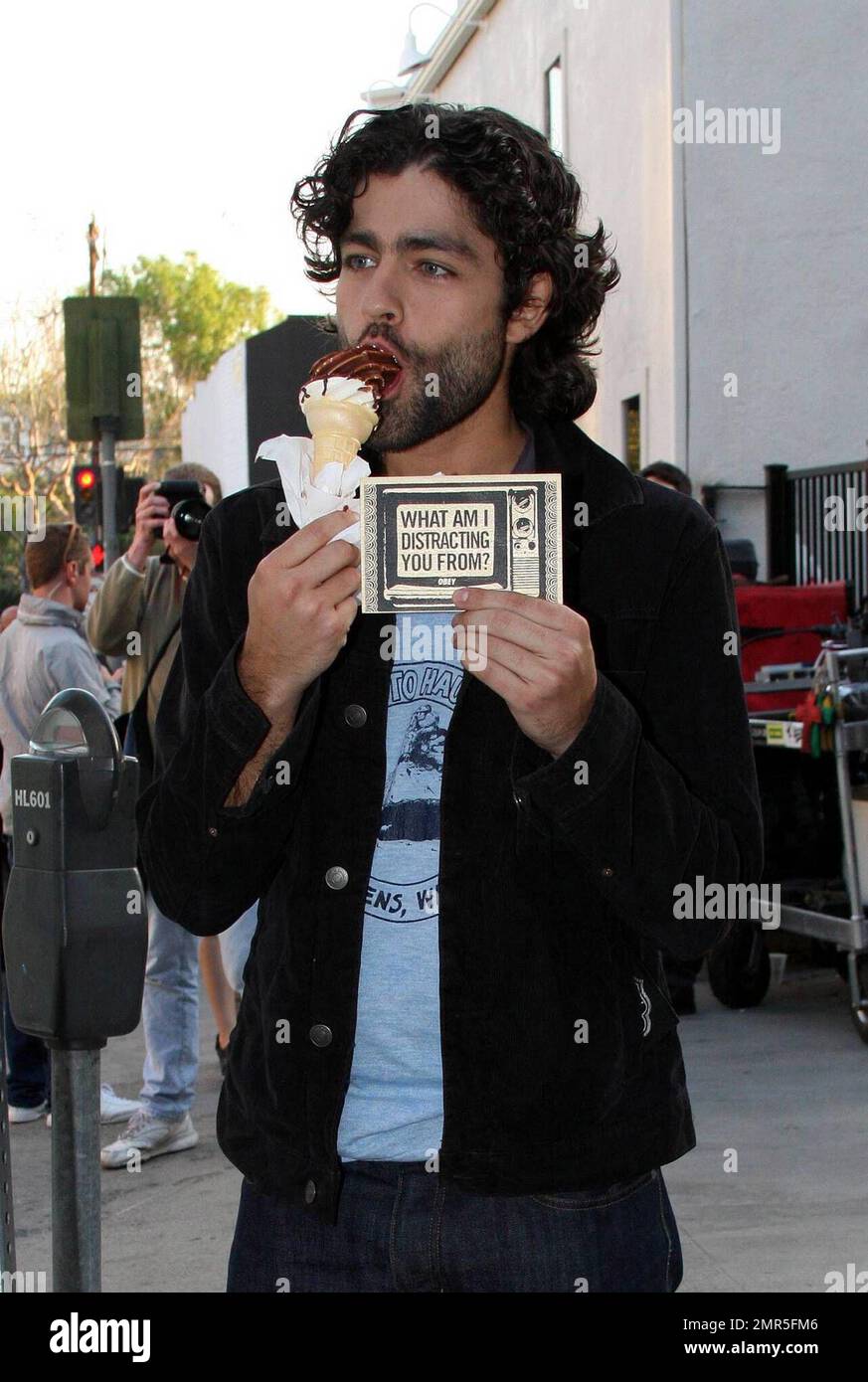 Adrian Grenier grabs some ice-cream in between takes on the set of ...