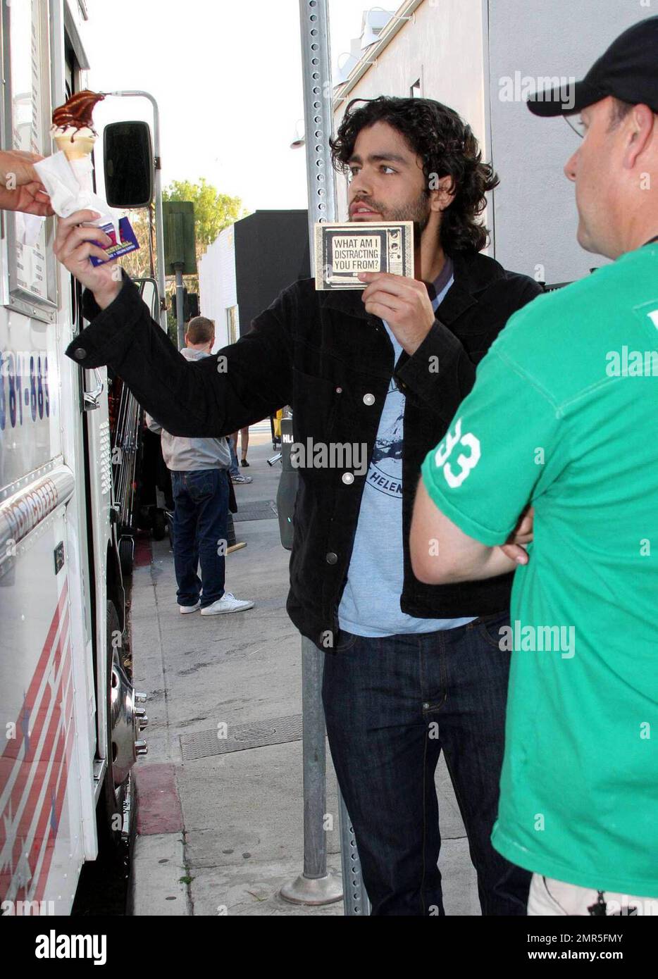 Adrian Grenier grabs some ice-cream in between takes on the set of ...