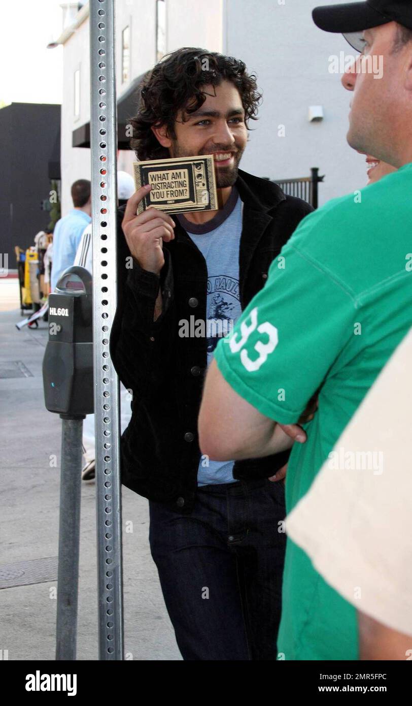 Adrian Grenier grabs some ice-cream in between takes on the set of ...