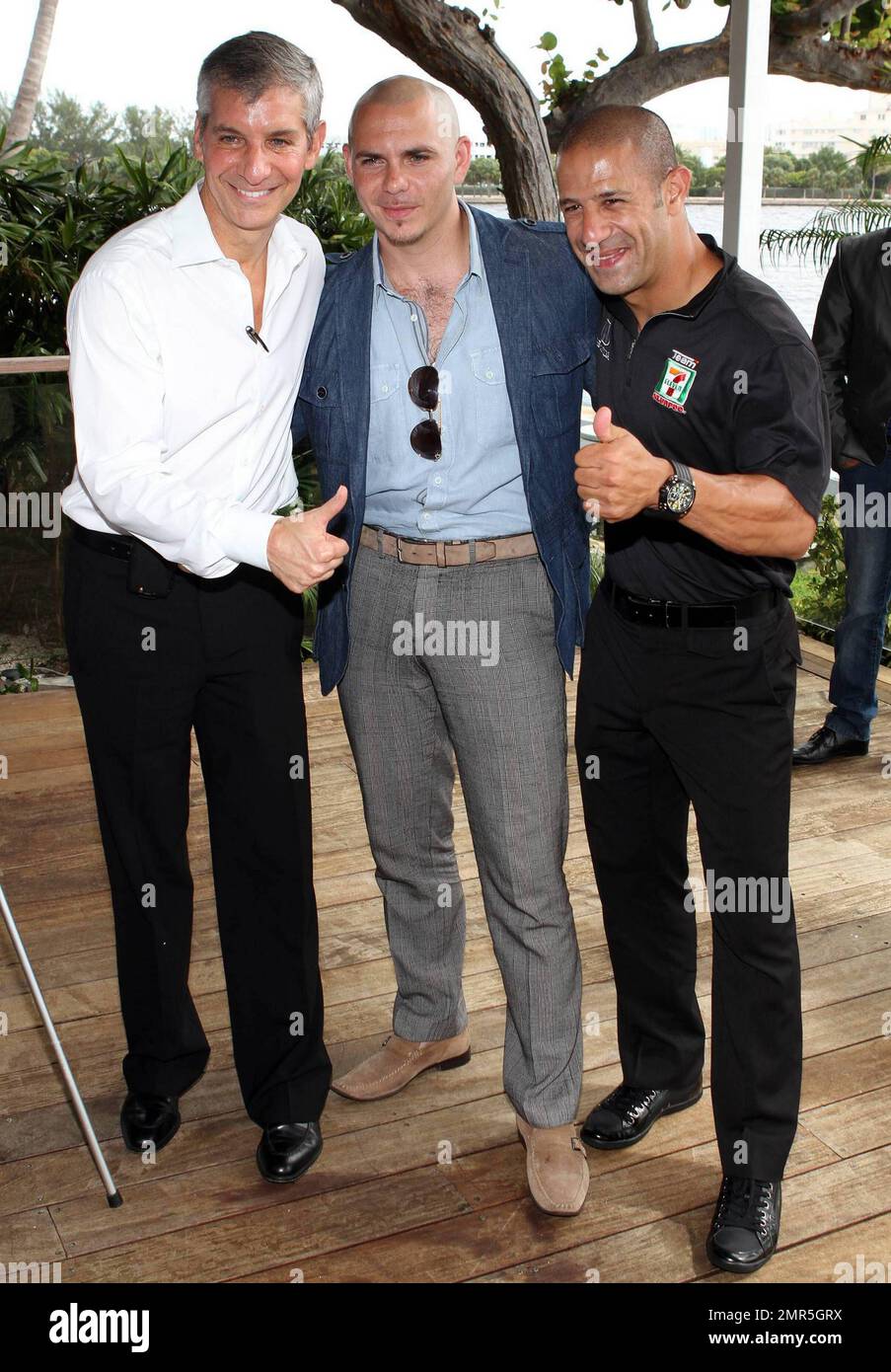 (L-R) Miami Commissioner Marc Sarnoff, musician Pitbull (Armando P rez ...