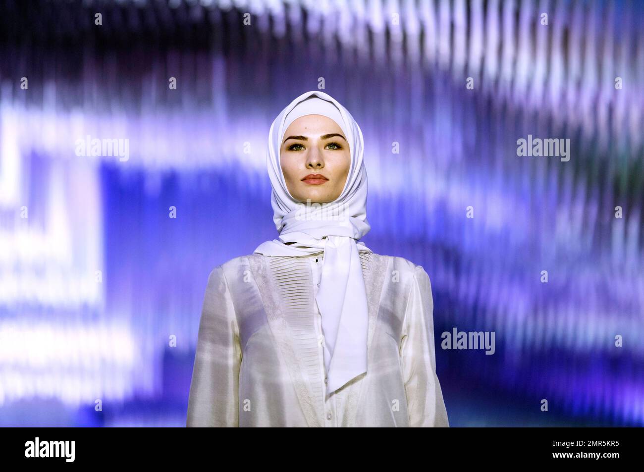 A model presents a creation by fashion designer Aishat Kadyrov ...