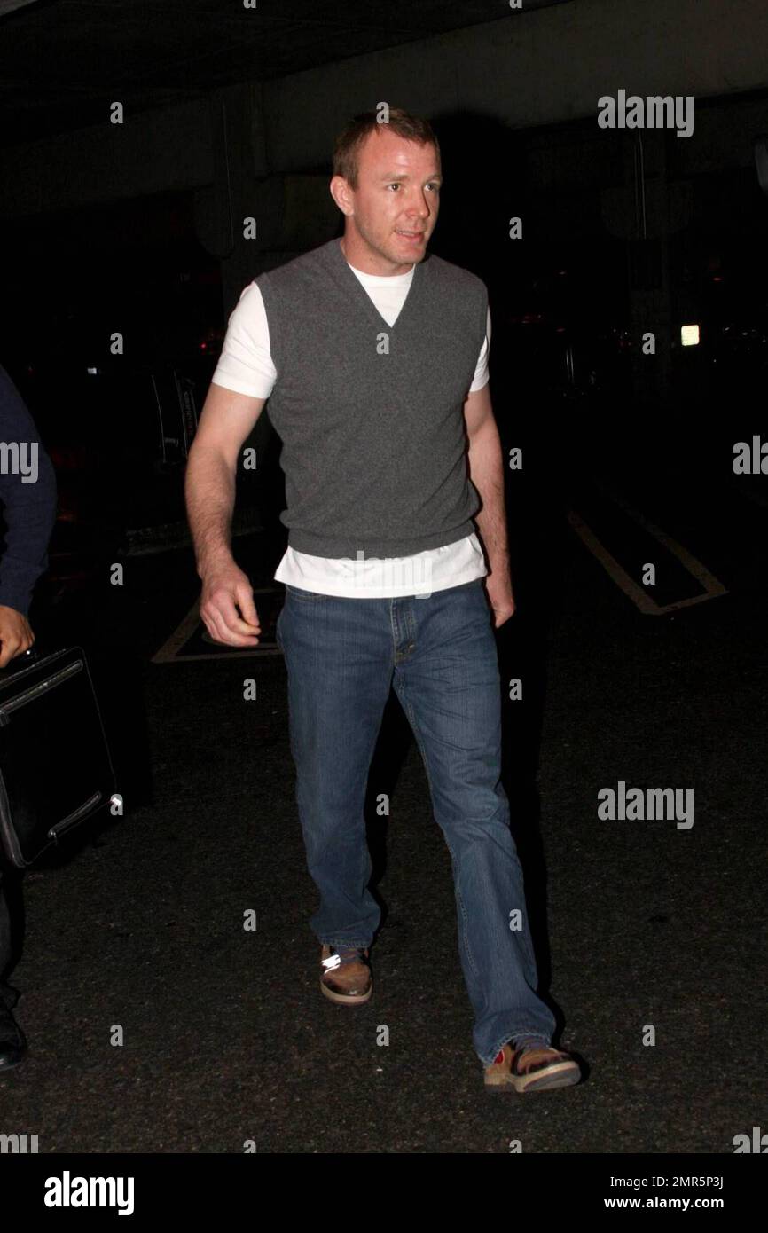 Guy Ritchie arrives at LAX after a flight from London. Madonna's ex was ...