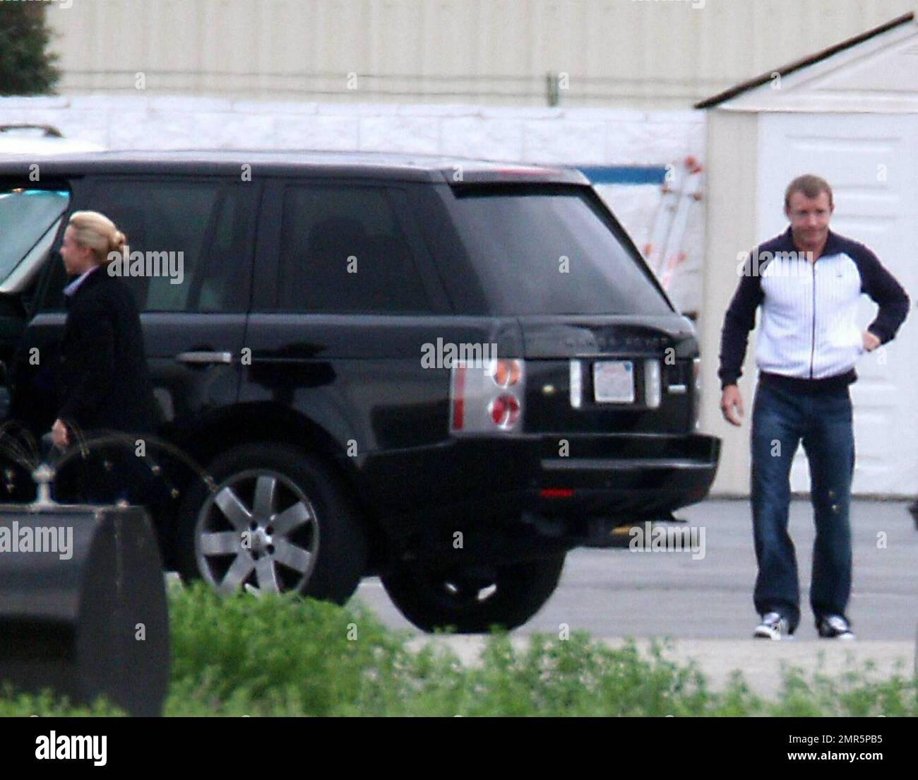 Exclusive!! Guy Ritchie departs on a private charter with a group of ...