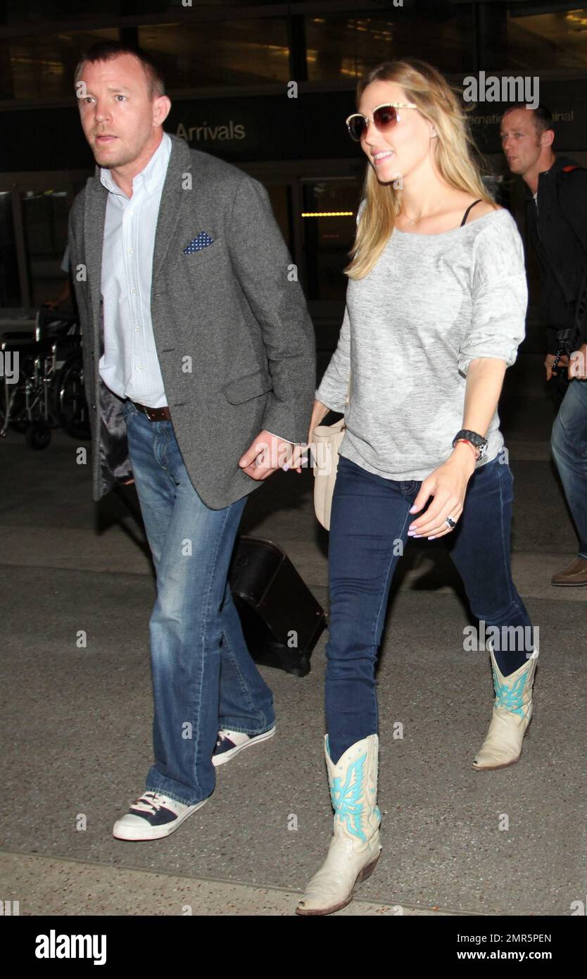 Director Guy Ritchie with his pregnant girlfriend Jacqui Ainsley ...