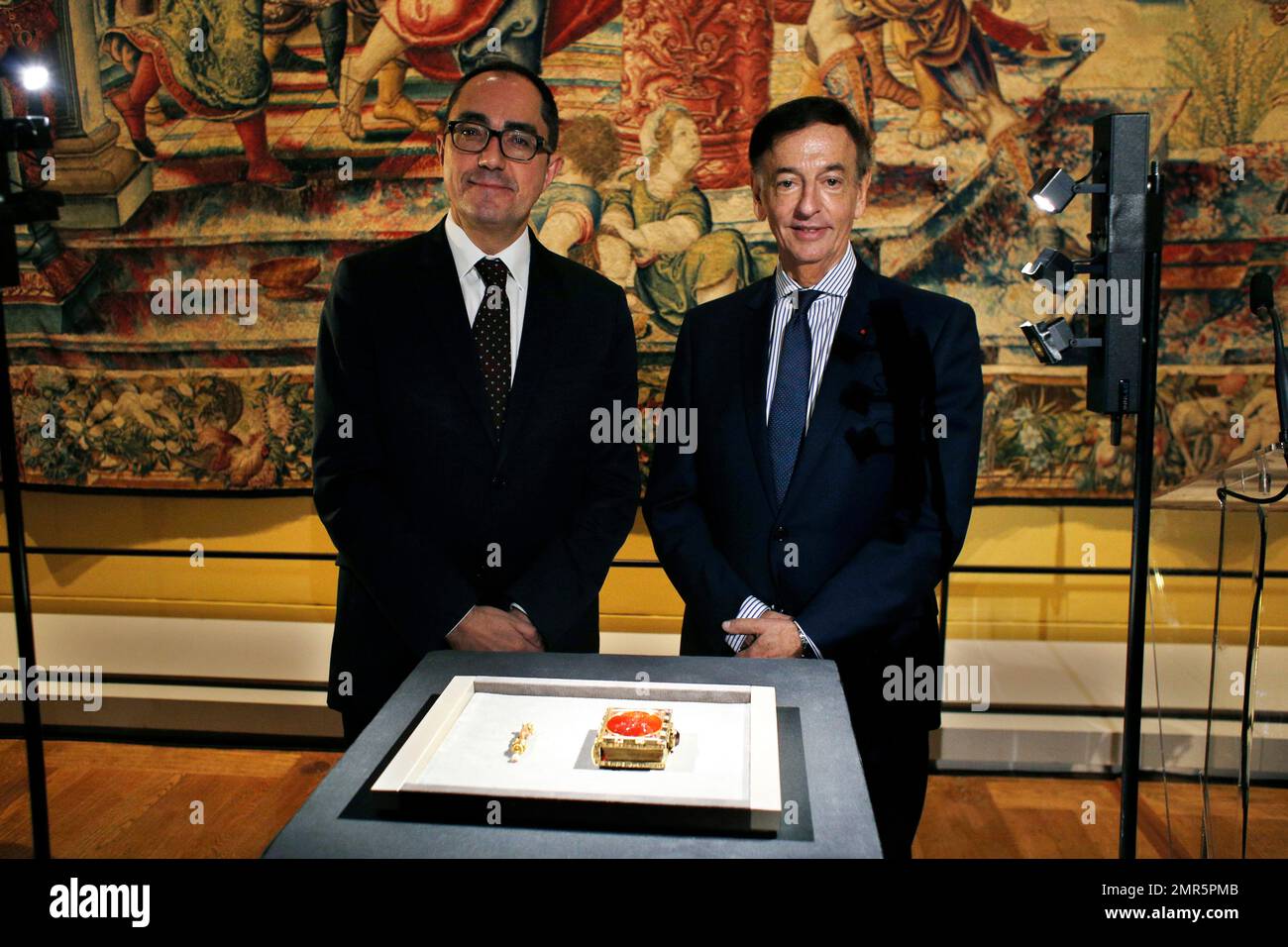 Louvre Museum Director Jean-Luc Martinez, left, and LVMH Director of ...