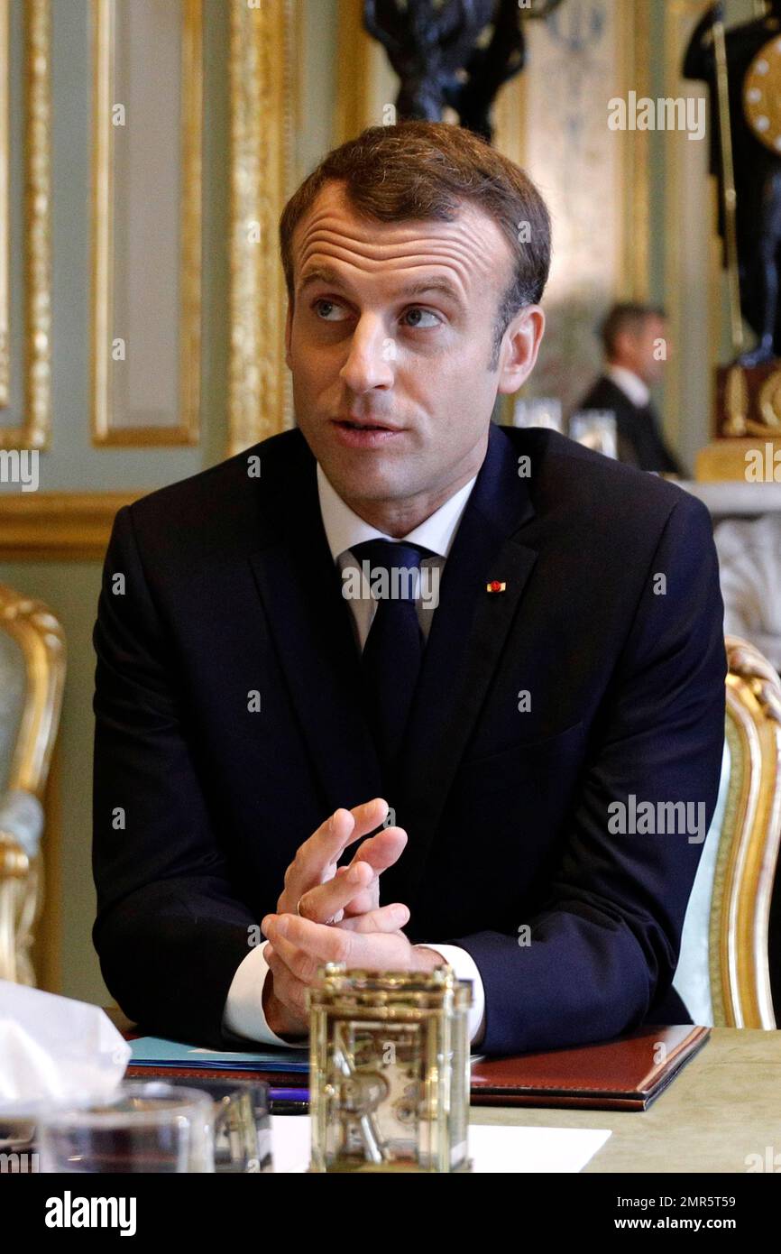 French President Emmanuel Macron talks to Irish Prime Minister Leo ...