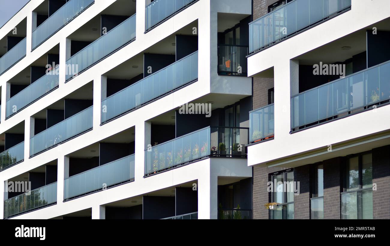 Modern apartment buildings on a sunny day with a blue sky. Facade of a ...
