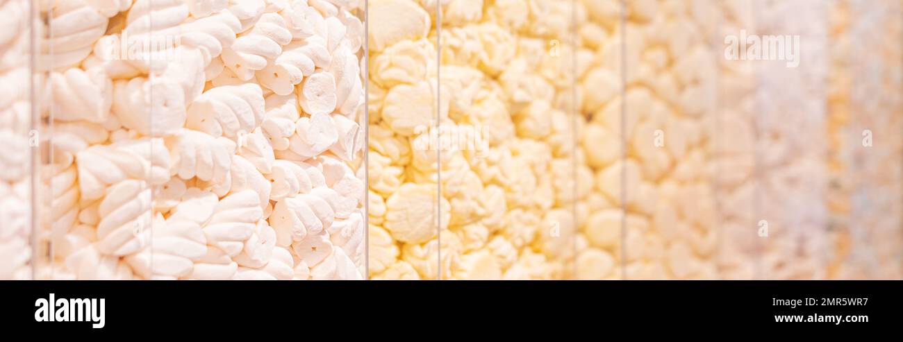 Pastel yellow marshmallows in a shop window Stock Photo - Alamy