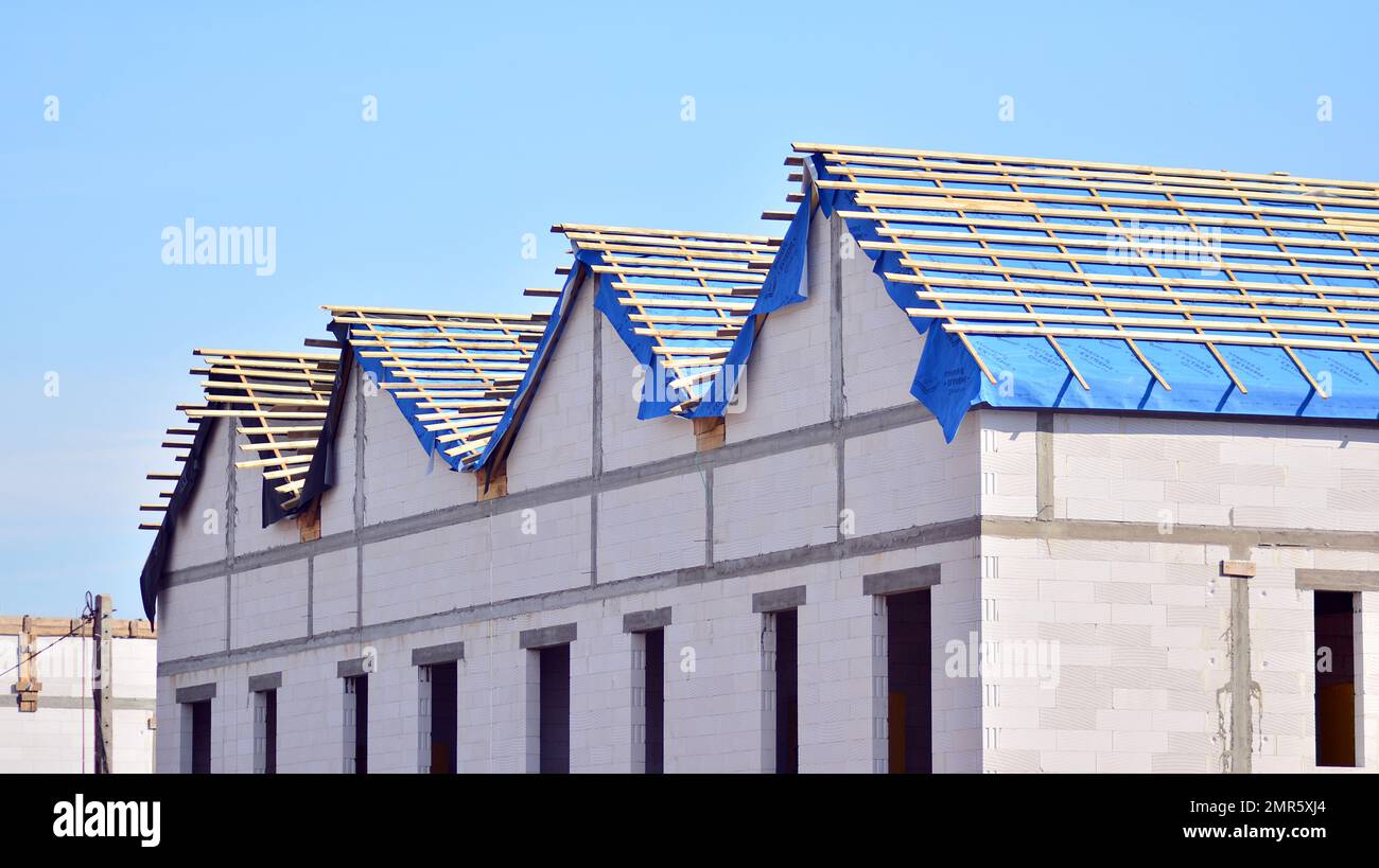 Terraced houses under construction. Housing estate development under ...