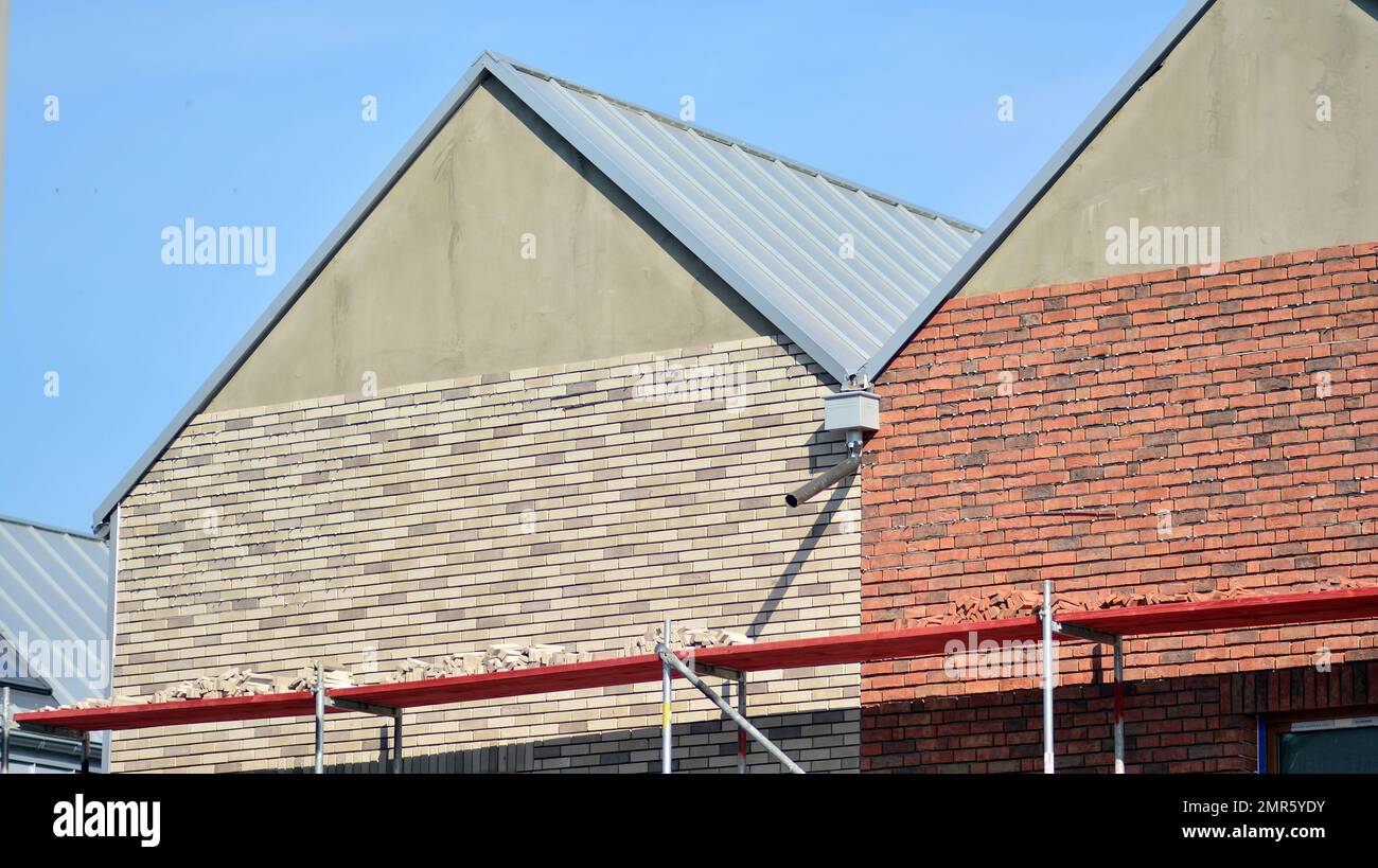 Terraced houses under construction. Housing estate development under ...